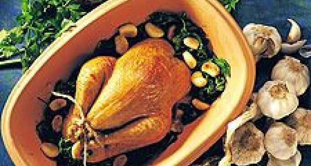 Oppskrift på Hvitløkskylling i leirgryte - Aperitif.no